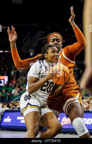 Texas center Kyla Oldacre (00) and North Carolina center Blanca Thomas ...