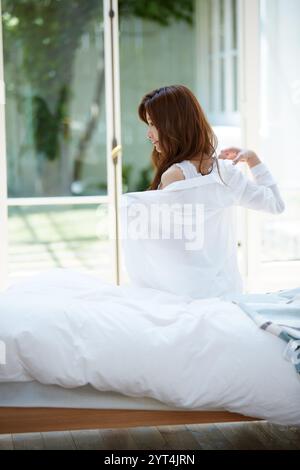 Fresh woman getting dressed in the morning Stock Photo - Alamy