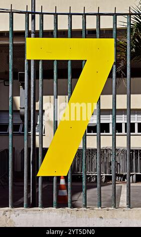7 number seven sign on fence Stock Photo - Alamy