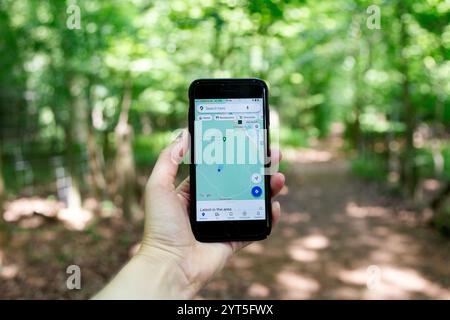 Hiker using Google Maps on iPhone for navigation Stock Photo - Alamy
