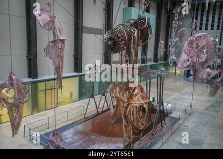 Open Wound with fabric hanging sculptures and mechanical installations ...