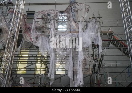 Open Wound with fabric hanging sculptures and mechanical installations ...