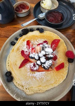 Crepe with whipped cream and fresh strawberries Stock Photo - Alamy