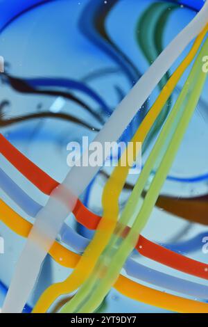 Yellow and blue threads close-up on a background of yellow and blue ...