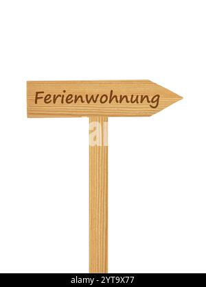 Arrow sign cut out of brown paper on piece of wood Stock Photo - Alamy