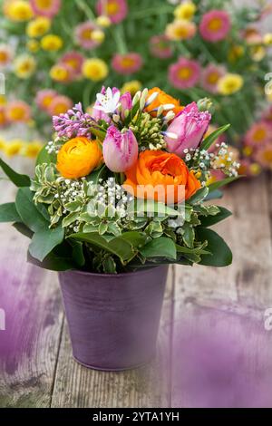 Flowers in a vase (Freesia, Tulip, Orchid Stock Photo - Alamy