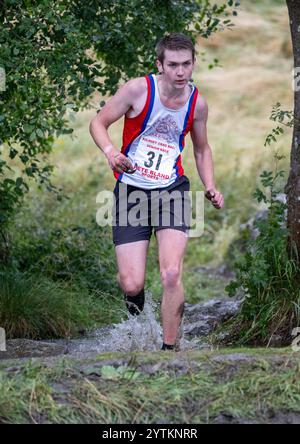Runners on the Kilnsey Crag fell race held at the Kilnsey Show in the ...