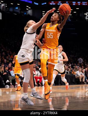 Tennessee guard Talaysia Cooper (55) drives for a shot as she's dfended ...