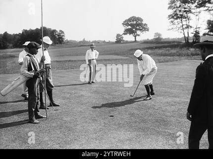 Playing golf between 1915 and 1923 Stock Photo - Alamy