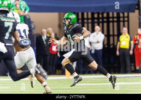 Oregon quarterback Dillon Gabriel runs a drill at the NFL football ...