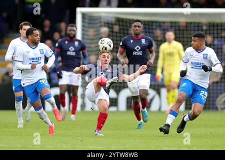 Ross County's Joshua Nisbet (left) and Celtic's Cameron Carter-Vickers ...
