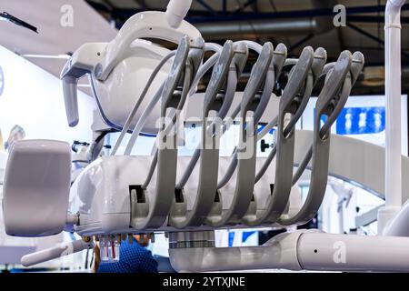 Height adjustable dental handpiece holders with touchscreen monitor ...