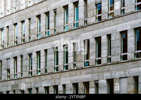 Modern Office Building Facade with Repetitive Windows and Stone ...