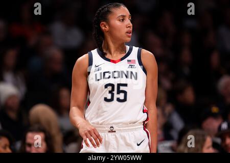UConn guard Azzi Fudd (35) follows through on a free throw in the first ...
