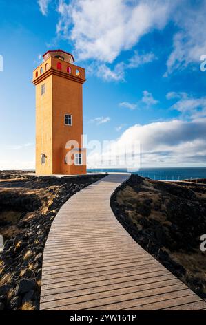 Orange lighthouse at Svörtuloft, Iceland Stock Photo - Alamy