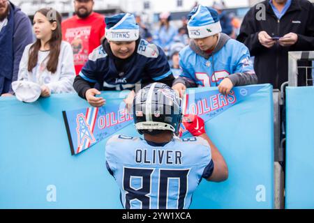 Tennessee Titans wide receiver Bryce Oliver is tackled by Tampa Bay ...