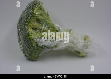 Broccoli placed on a white background Stock Photo - Alamy