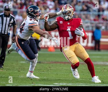 Chicago Bears defensive end Austin Booker (94) moves across the field ...