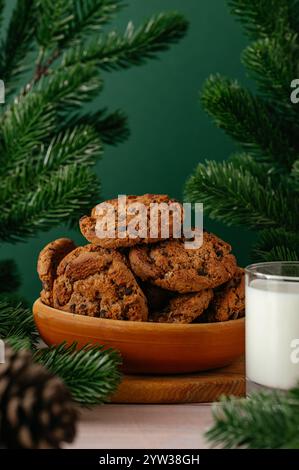 Many baked homemade crunchy oatmeal cookies on metal sheet in oven ...