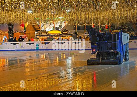 special machine on figure skating rink polishes ice before skating ...