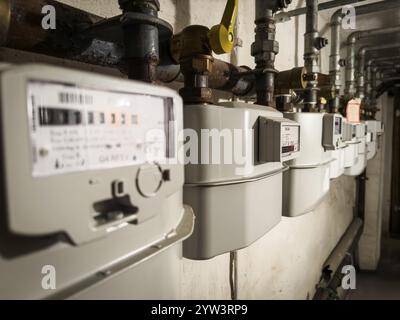 Row of gas meters in a basement in Duesseldorf Stock Photo - Alamy