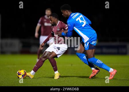 Peterborough United's Emmanuel Fernandez (left) and Abraham Odoh ...