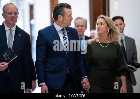 At center, Jennifer Rauchet, wife of Pete Hegseth, President-elect ...