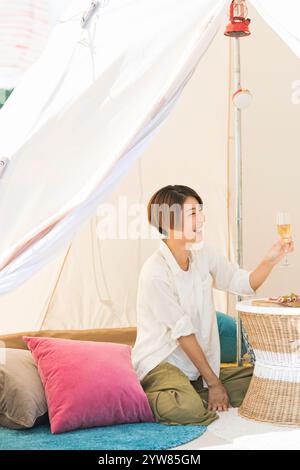 Woman in her 20s glamping Stock Photo - Alamy