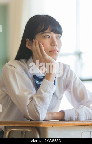 High school girl with cheekpieces Stock Photo - Alamy