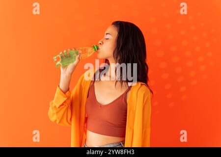 Half woman drinking soda water Stock Photo - Alamy