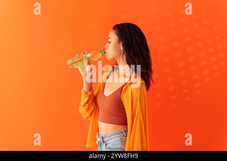 Half woman drinking soda water Stock Photo - Alamy