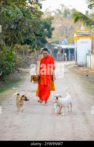 Buddhist monks on Don Daeng island on the Mekong River, Muang, near ...