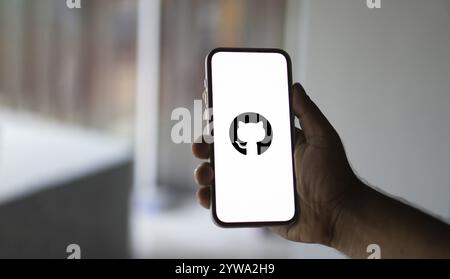 Github logo is displayed on smartphone Stock Photo - Alamy