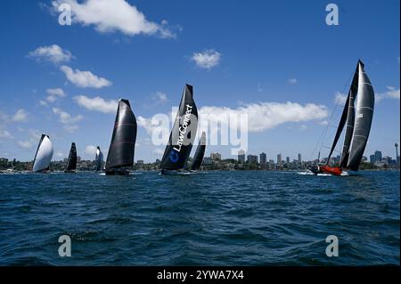 Master Lock Comanche during the start of 2025 Sydney Hobart yacht race ...