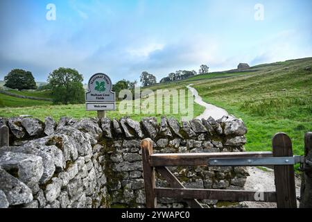 Malham Cove Fields sign and footpaths wiith camping Malham North ...