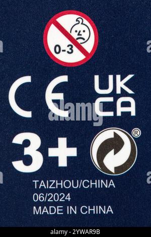 packaging symbols: CE mark symbol, fragile or handling with care symbol ...