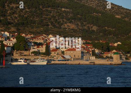 Town of Bol and harbour at sunset, Brac Island, Dalmatia, Croatia ...