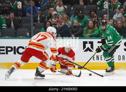 Calgary Flames' Connor Zary, center, scores a goal against Philadelphia ...