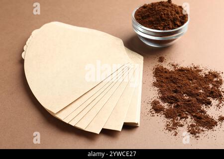 Paper filters and instant coffee on brown background, closeup Stock ...