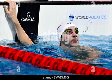 Jack Alexy of the United States reacts after competing in the men's 100 ...