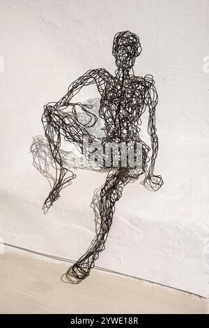 Wire work human figures, made from wire & conveying shape and form ...