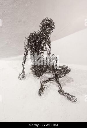 Wire work human figures, made from wire & conveying shape and form ...