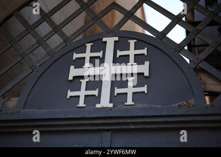 Jerusalem Cross symbolising the Stigmata, the Holy Land Cross, the gate ...