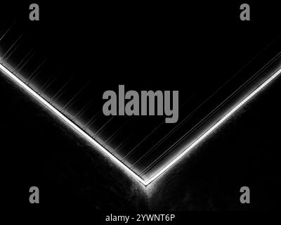 Neon Light Fixture: Angular Illumination Against Black Stock Photo - Alamy