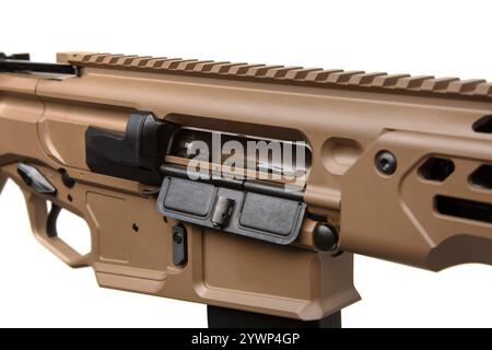 Modern tactical rifle with tan polymer stock, precision barrel, and ...