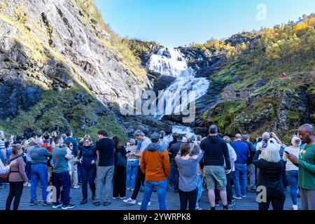 Tourists disembark Flam railway train to view Kjosfossen waterfall on ...
