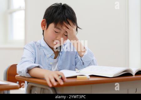 Primary school student who gets sick during class Stock Photo - Alamy