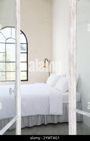 Large bedroom peeking through window Stock Photo - Alamy