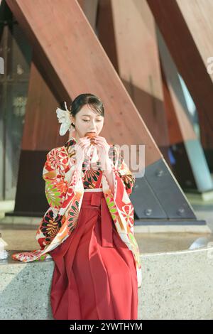 Young Happy Woman University Graduates in Graduation Gown and Cap to ...