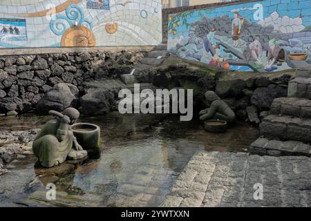 Traditional bathing pool along the Jeju Olle Trail in rural Jeju Island ...